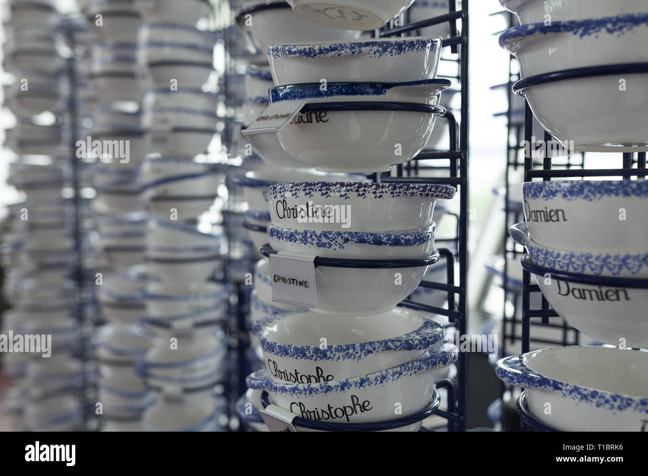 White plates with written names. nominal dishes Stock Photo - Alamy