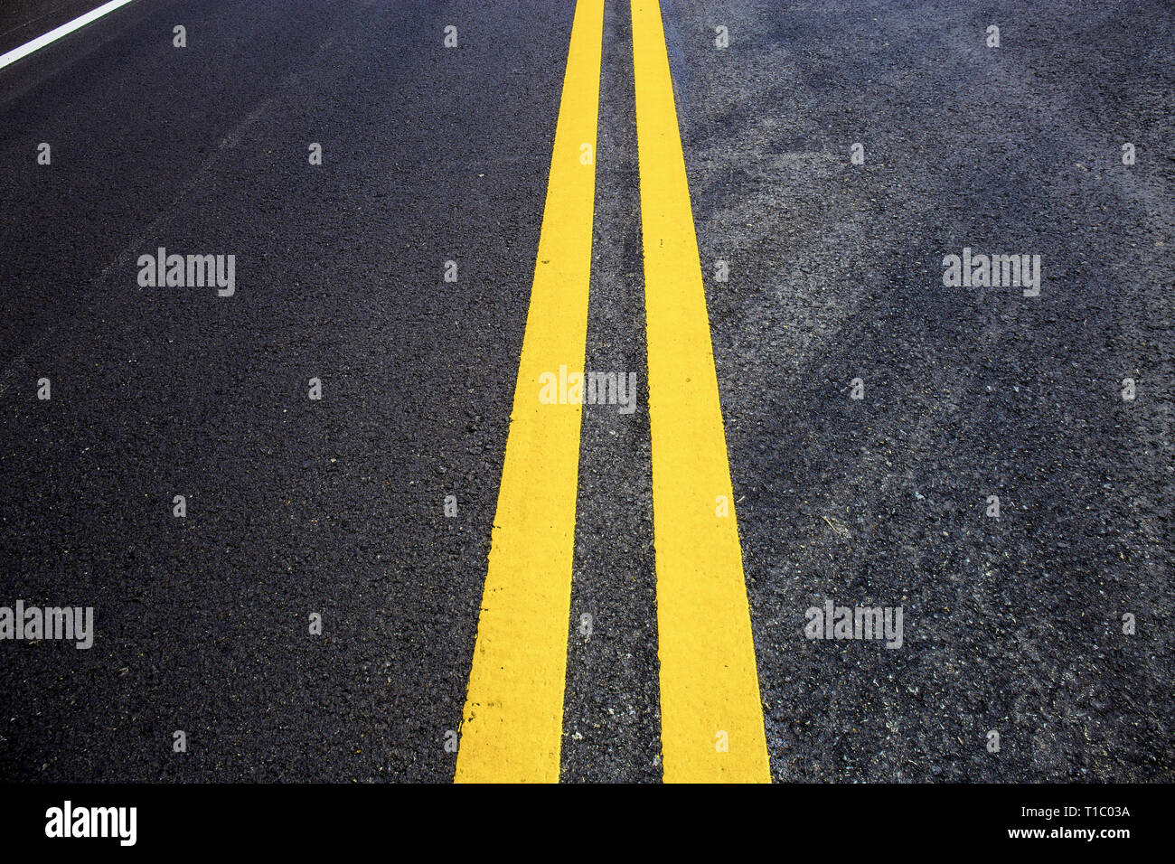 Traffic line of lane on road with texture background Stock Photo - Alamy