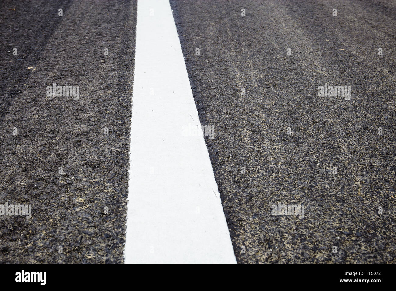 Traffic line of road with texture background Stock Photo - Alamy