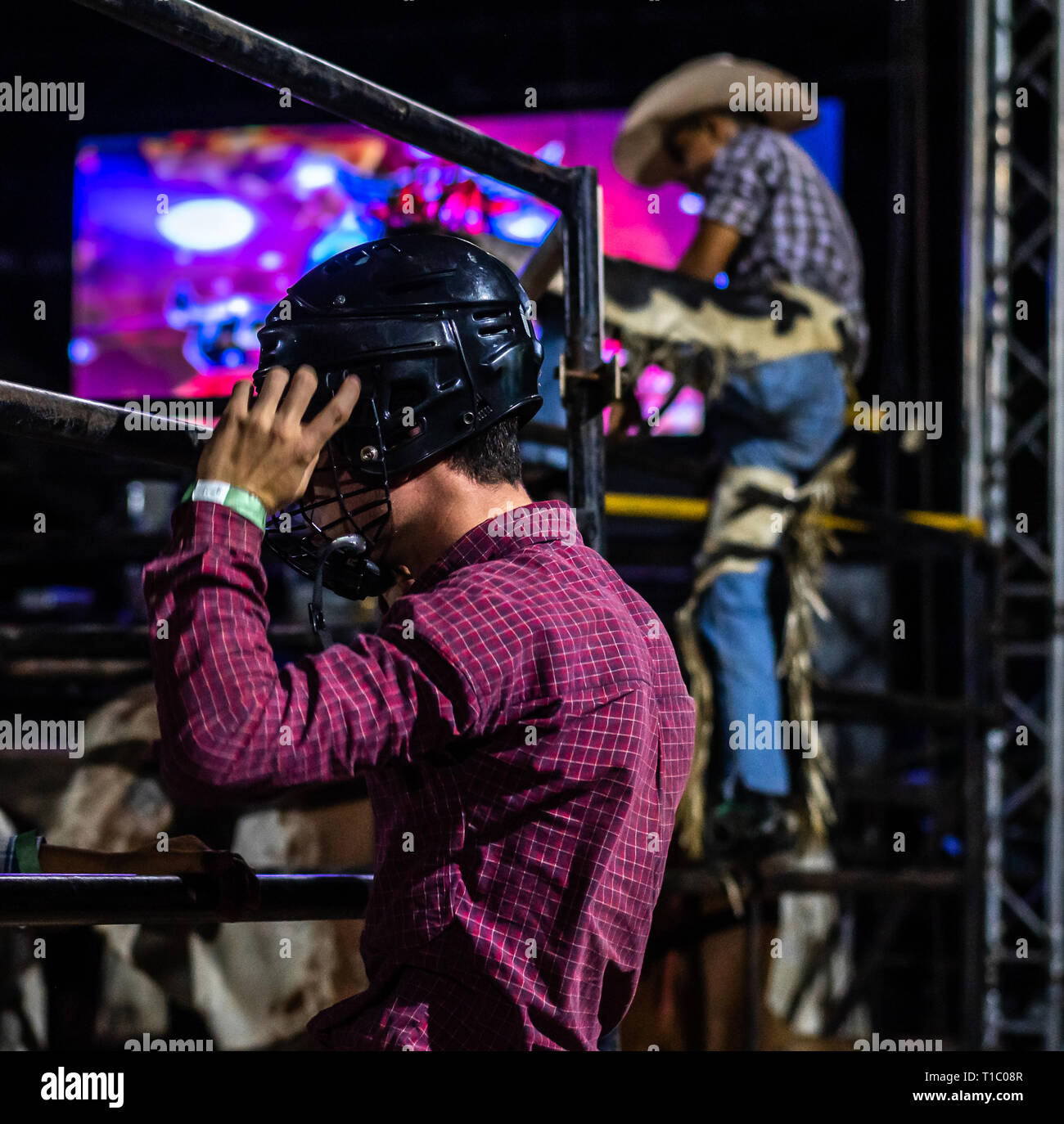 latin bull riders getting ready before Guatemalan rodeo Stock Photo - Alamy