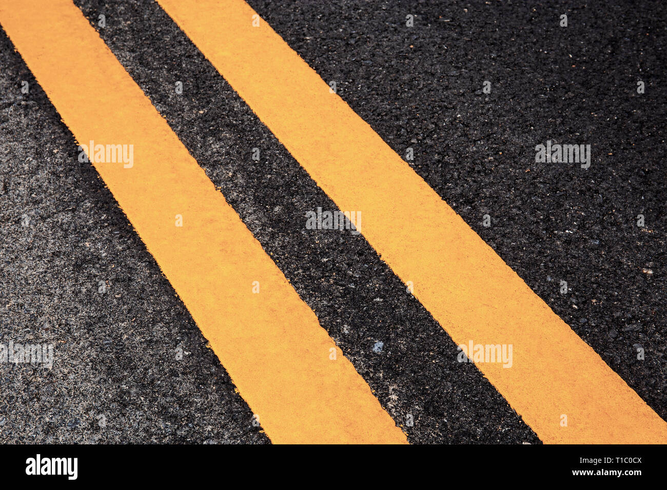 Traffic line on street with texture background Stock Photo - Alamy
