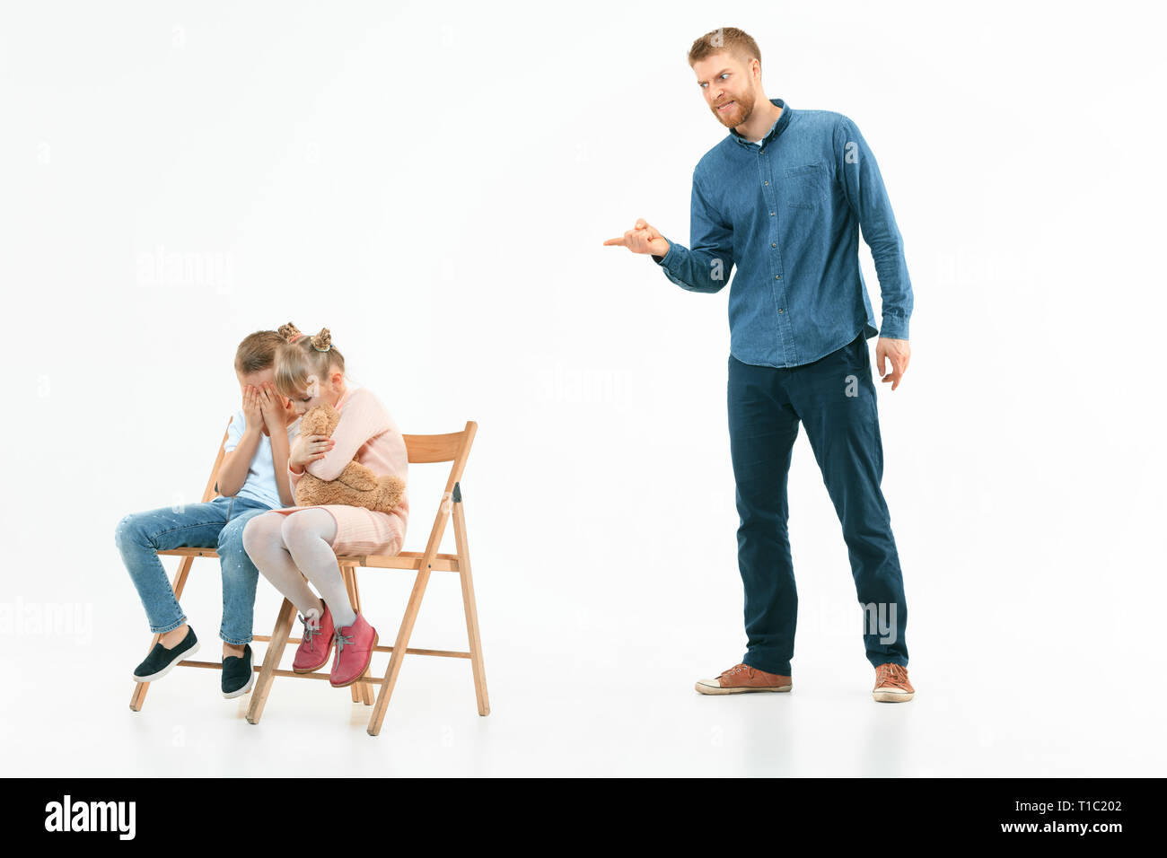 Father ignoring child Cut Out Stock Images & Pictures - Alamy