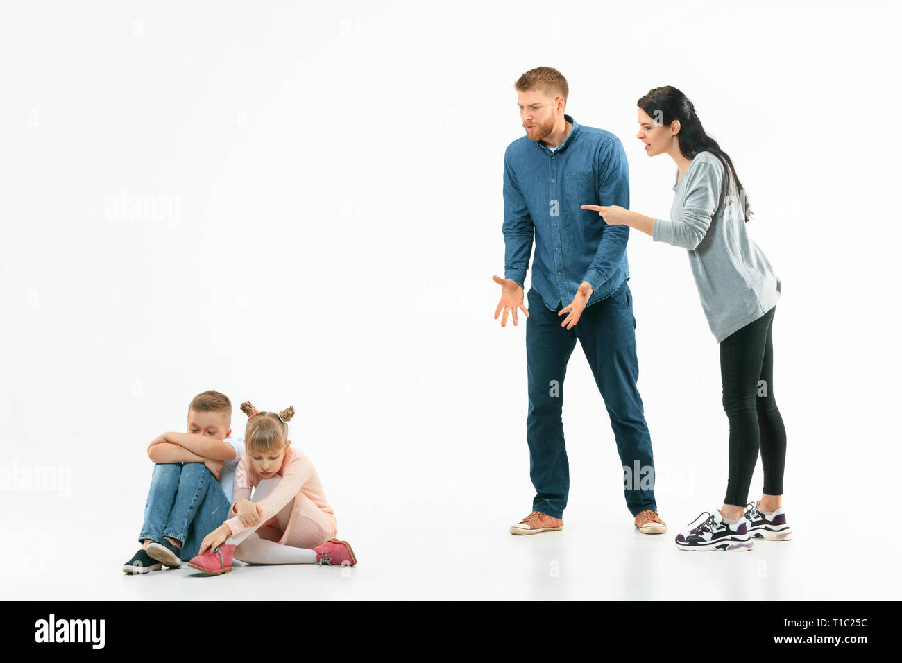 Angry parents scolding their children - son and daughter at home ...