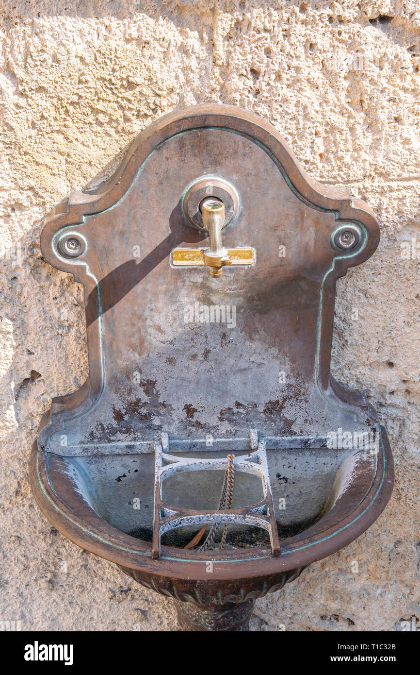 old historical guard basin at an old wall at a church Stock Photo - Alamy