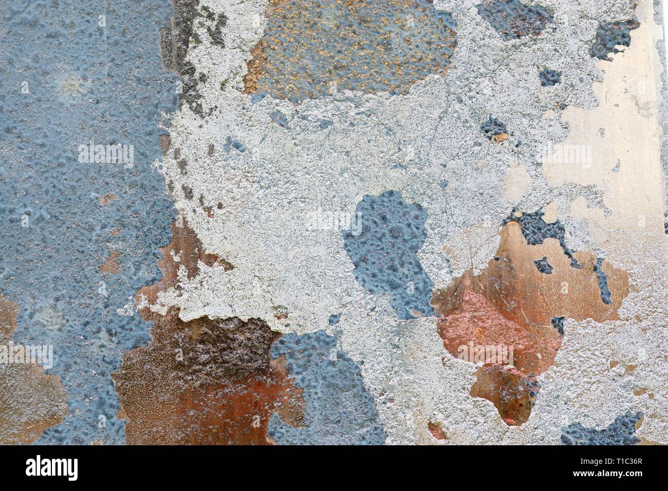 Close up detailed surface of weathered paint on different walls in high ...