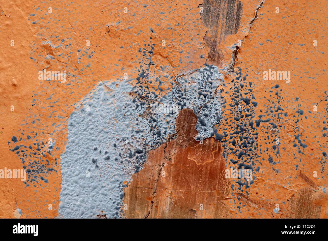 Close up detailed surface of weathered paint on different walls in high ...