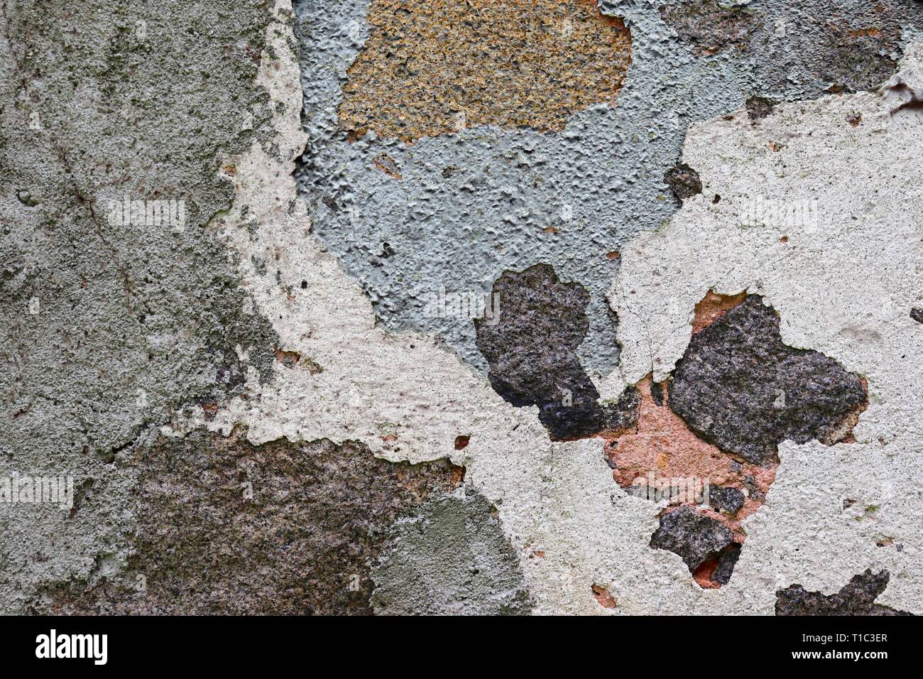 Close up detailed surface of weathered paint on different walls in high ...
