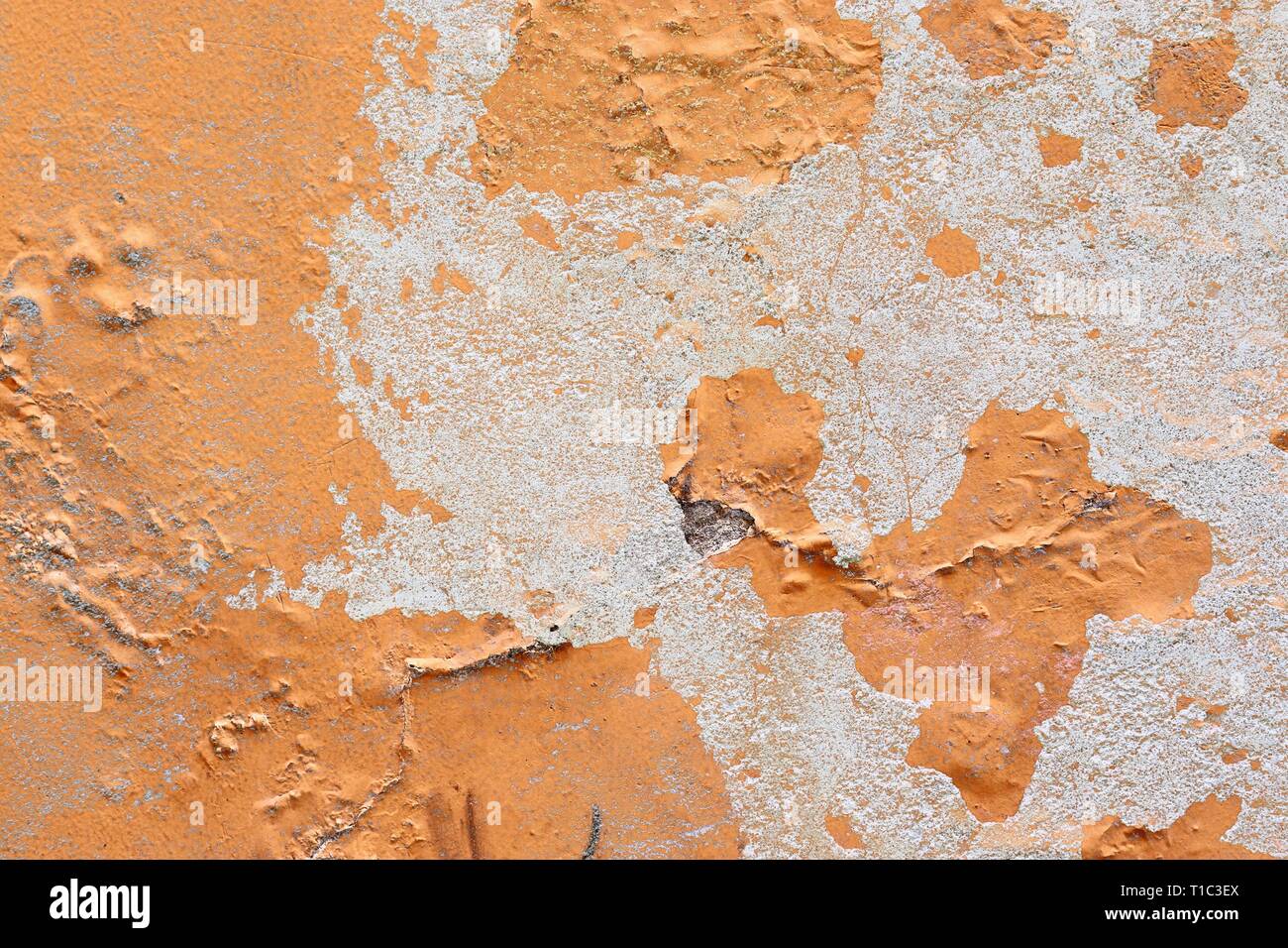 Close up detailed surface of weathered paint on different walls in high ...