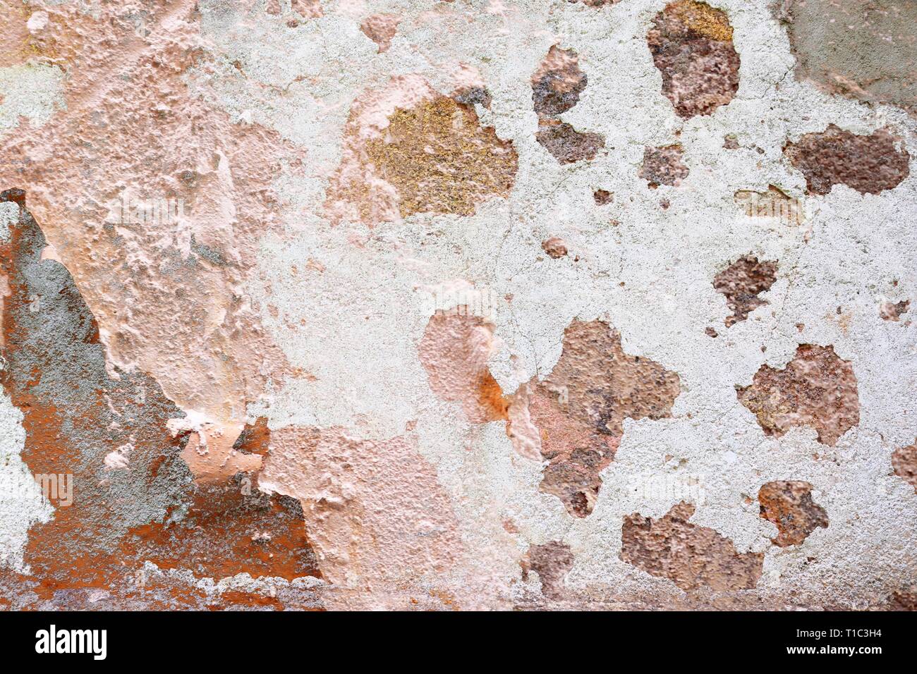 Close up detailed surface of weathered paint on different walls in high ...