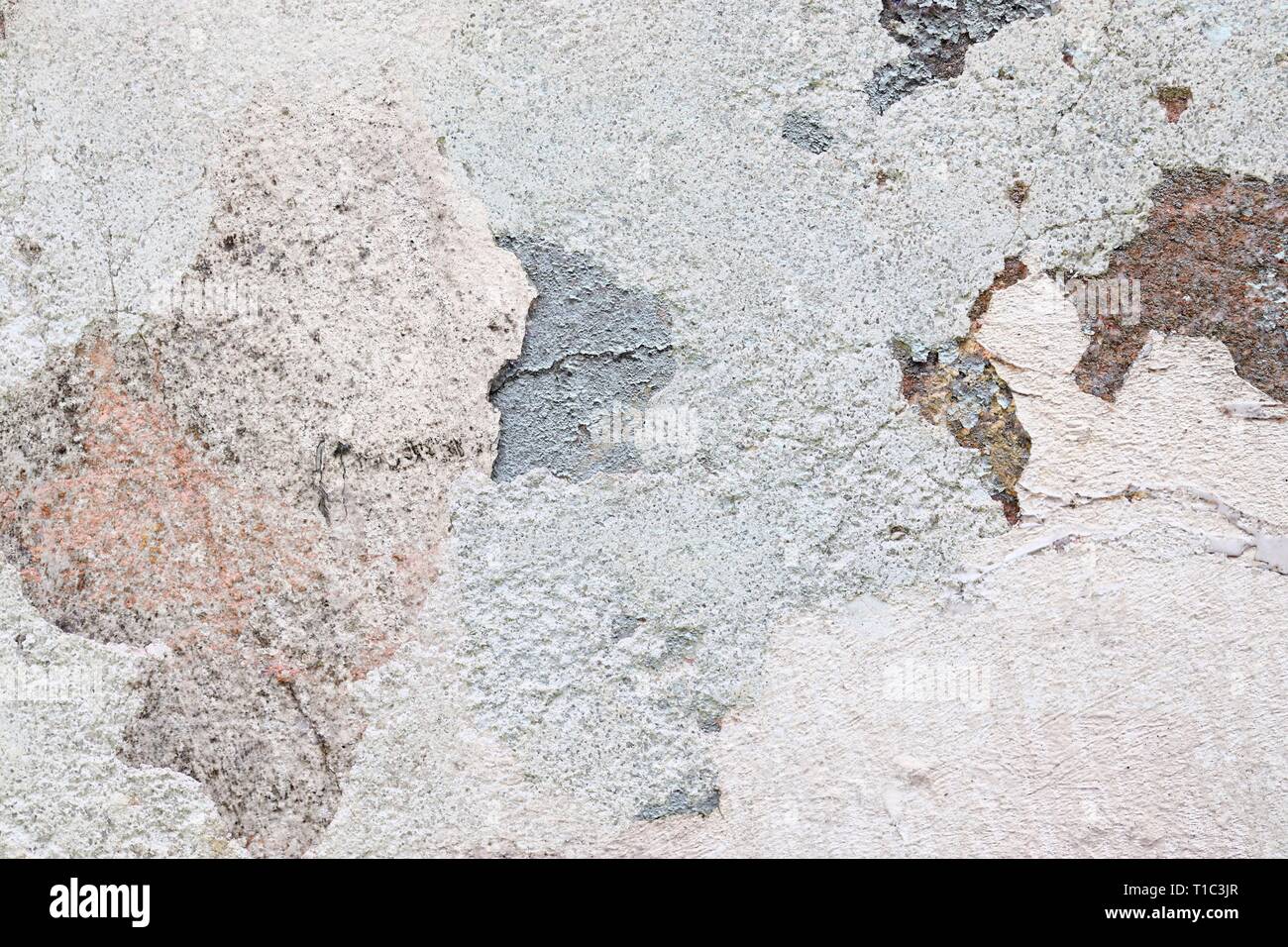Close up detailed surface of weathered paint on different walls in high ...