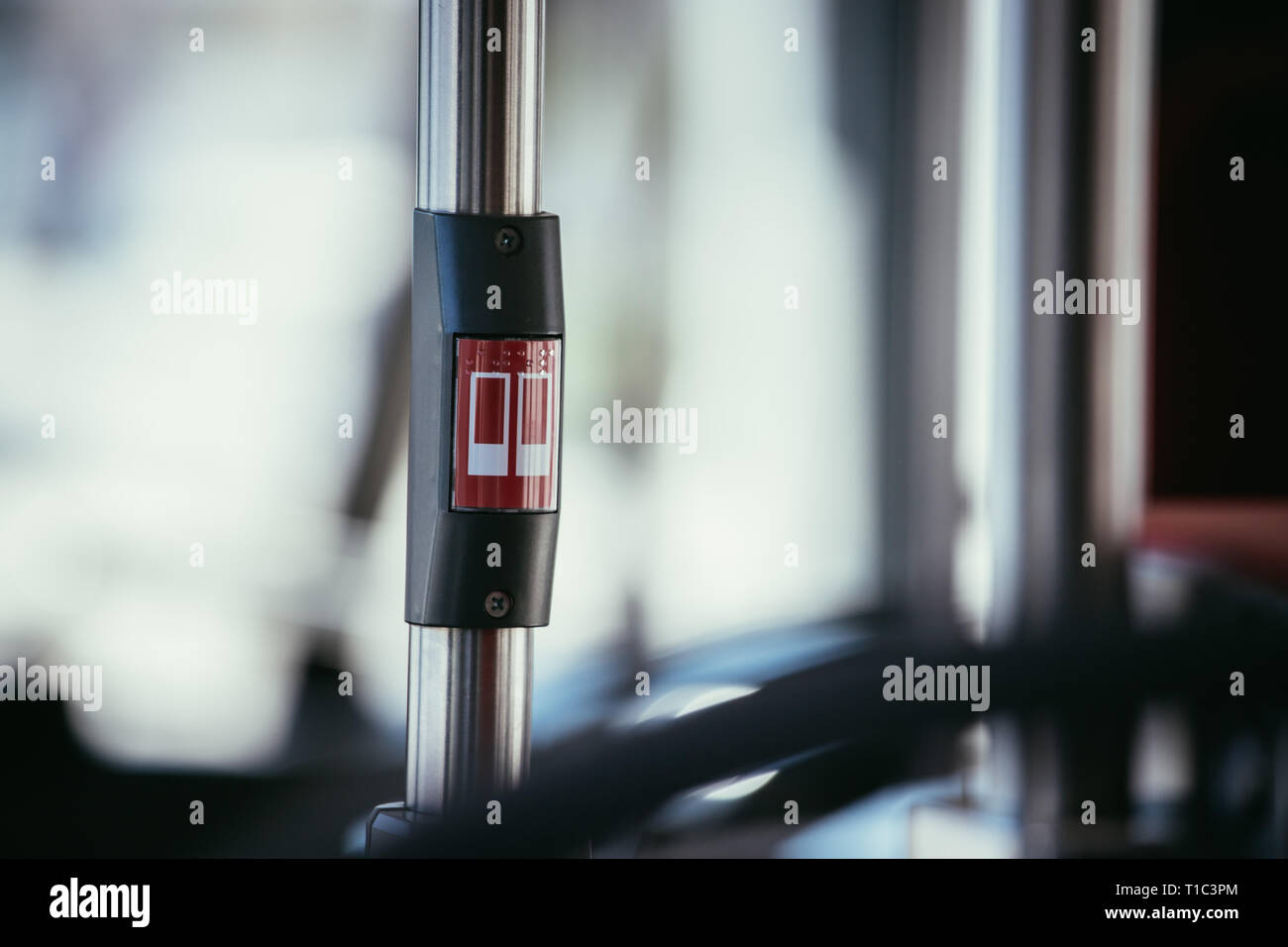 Red stop button in a bus, commuting, public transport Stock Photo - Alamy