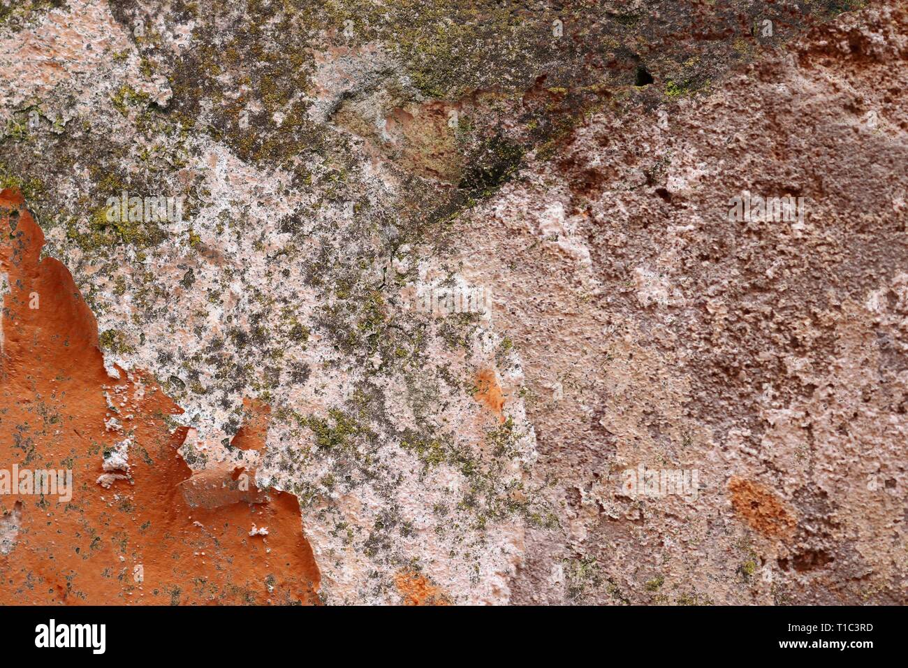 Close up detailed surface of weathered paint on different walls in high ...
