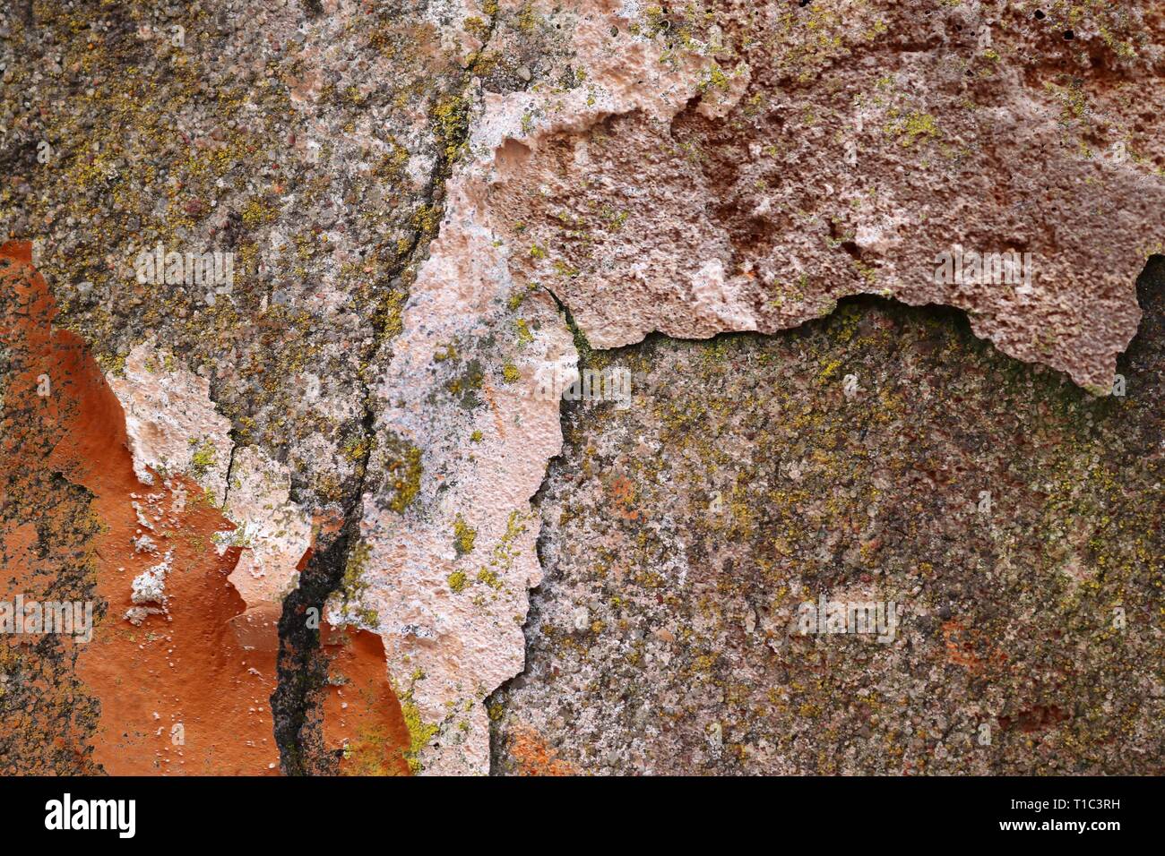 Close up detailed surface of weathered paint on different walls in high ...