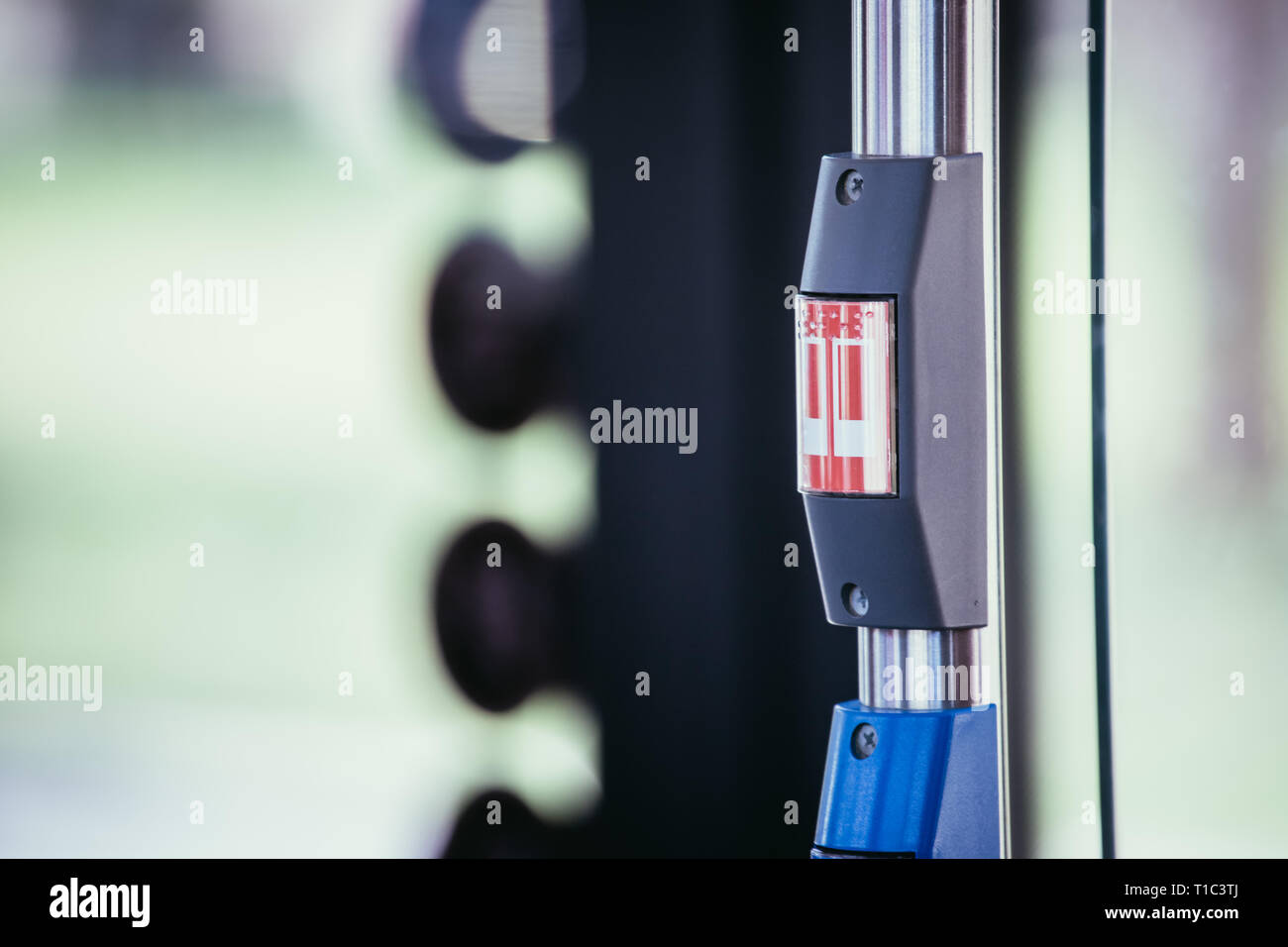 Red stop button in a bus, commuting, public transport Stock Photo - Alamy