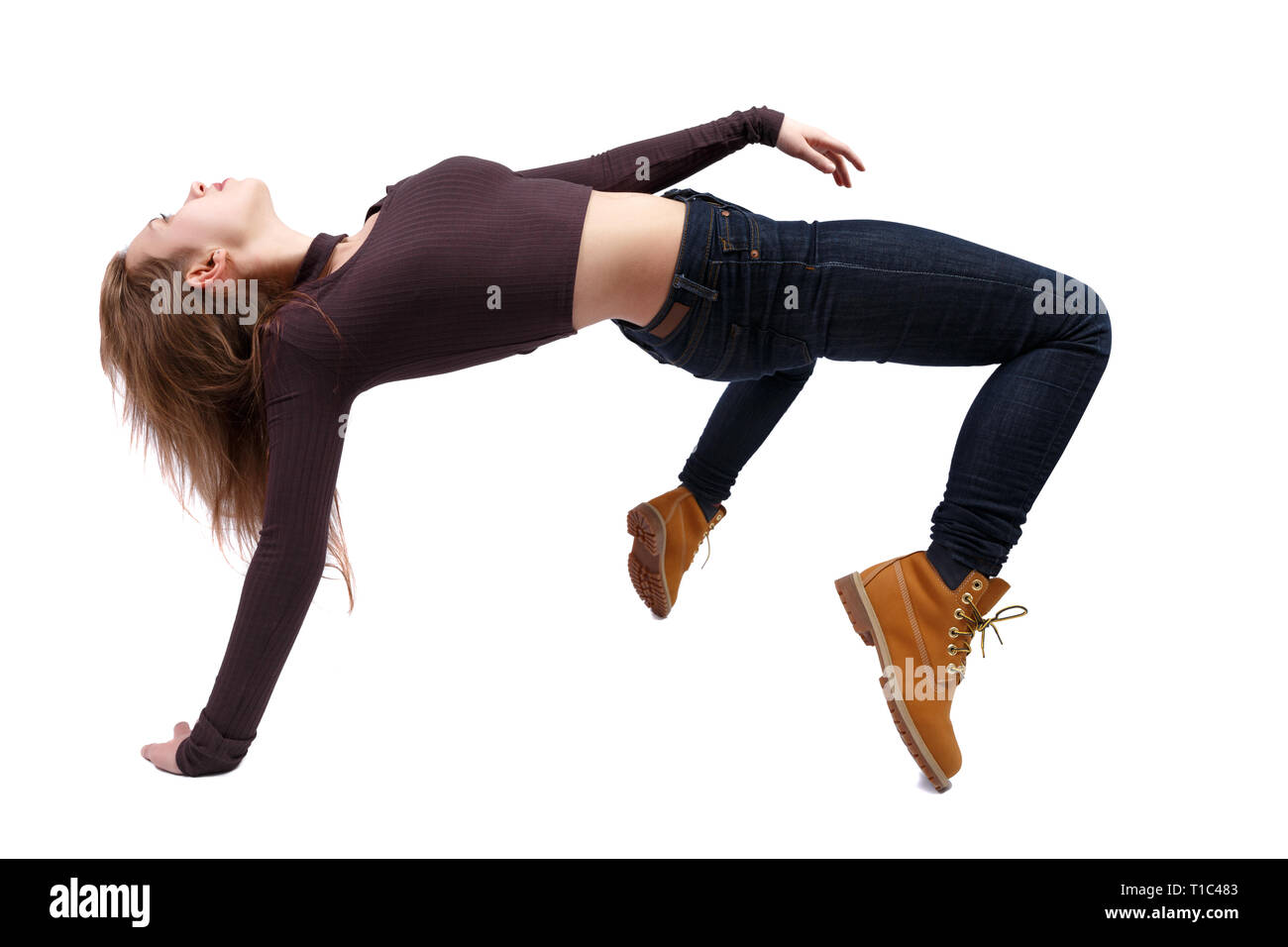 Side view of a woman dancing ballet. girl is balancing. Rear view ...