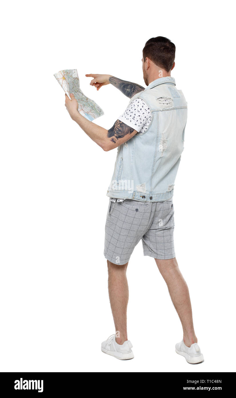 Back view of a pointing man with a map. backside view of person. Rear ...