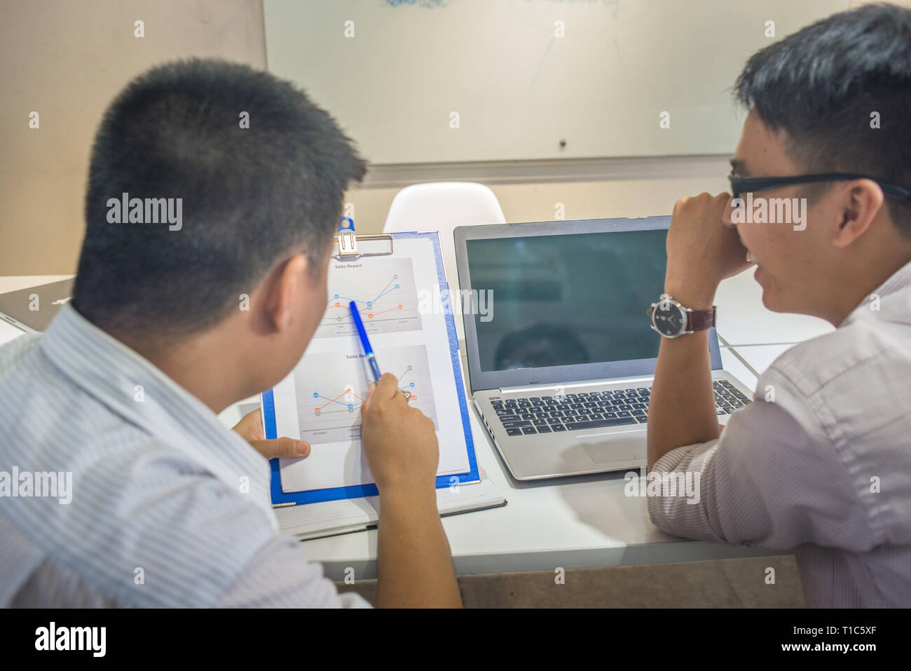 Explaining sales report hi-res stock photography and images - Alamy