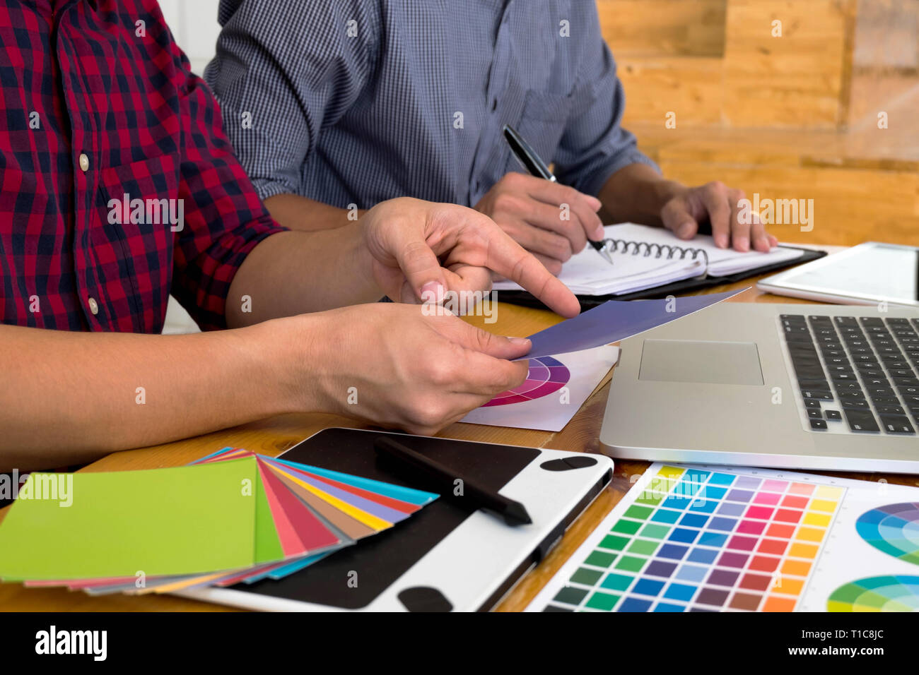 Graphic designers choose colors from the color bands samples for design ...