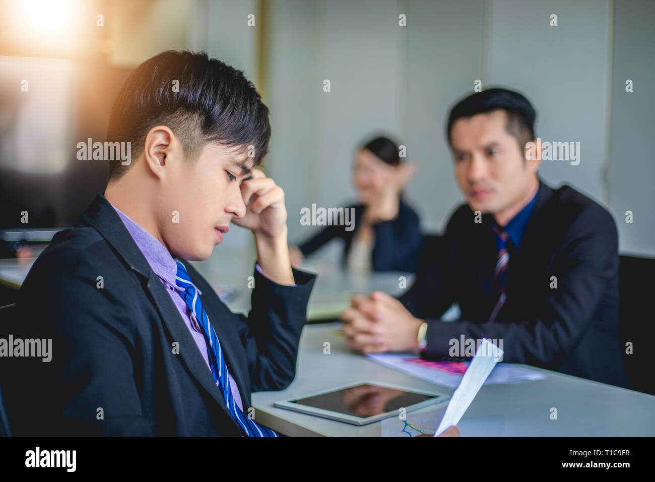 businessman serious about the work hard done until the headache Stock ...