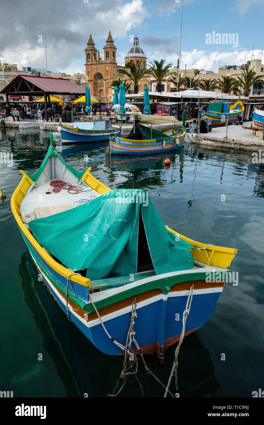 Traditional colourful Maltese fishing boats known as luzzu, Marsaxlokk ...