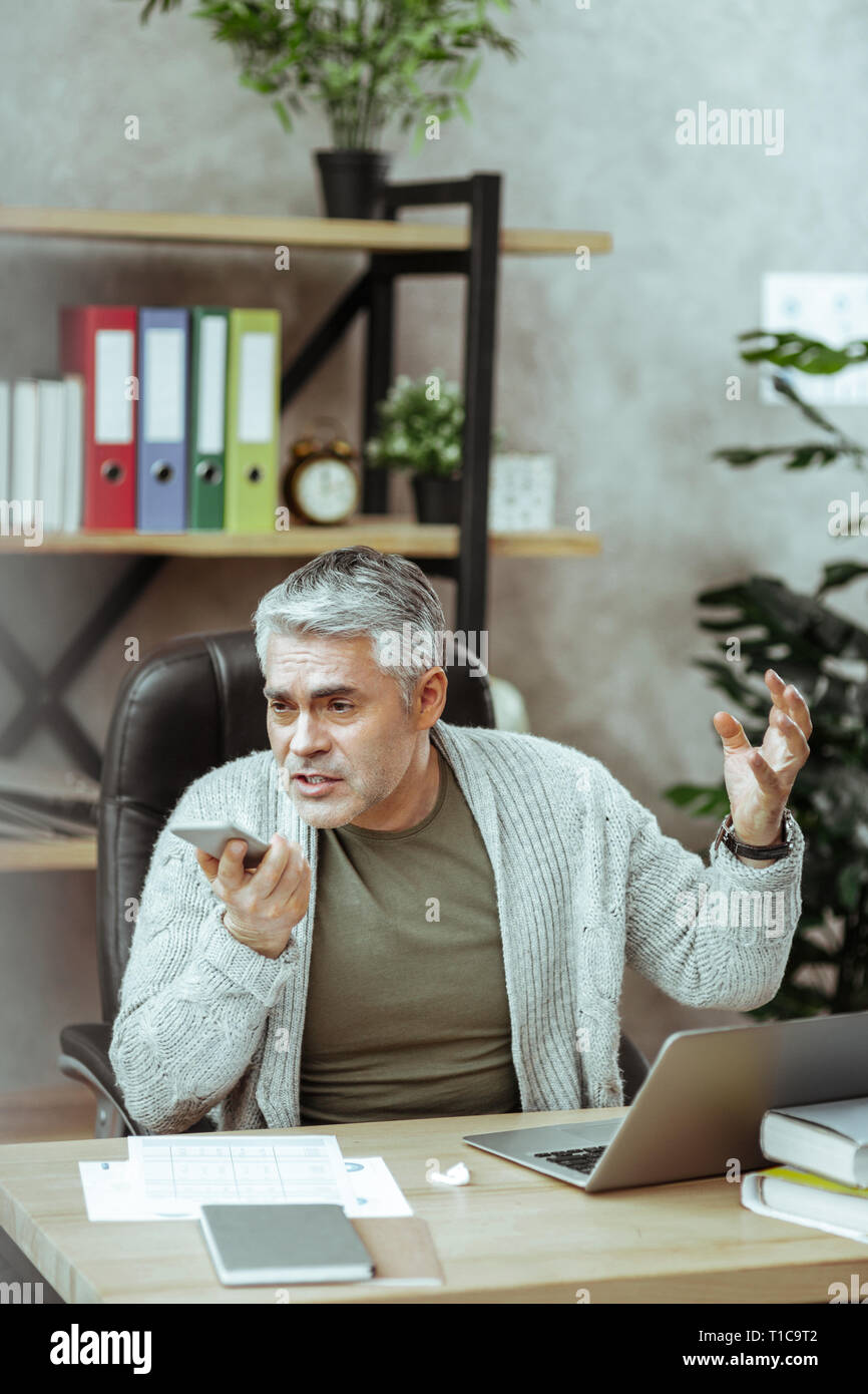 Emotional man having conversation hi-res stock photography and images ...