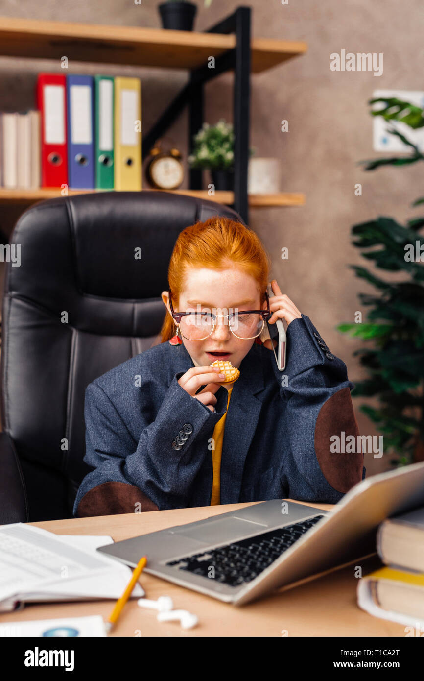 Nice positive girl making a phone call Stock Photo - Alamy