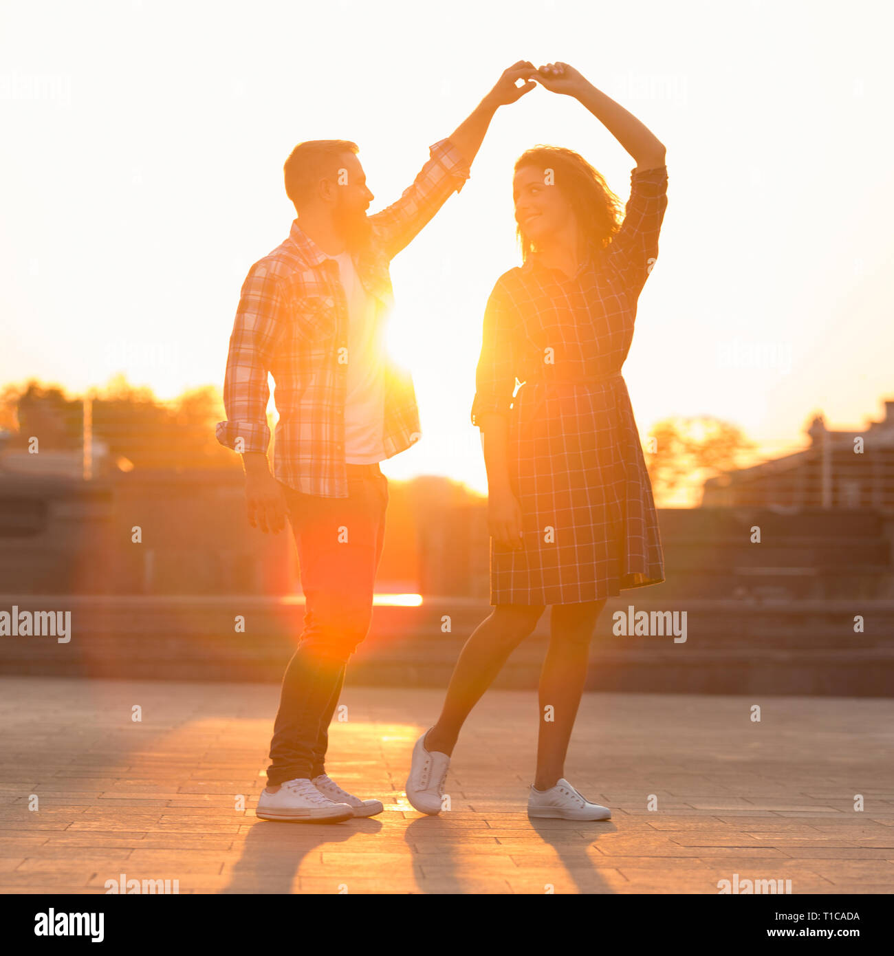 Couple Dancing At Sunset