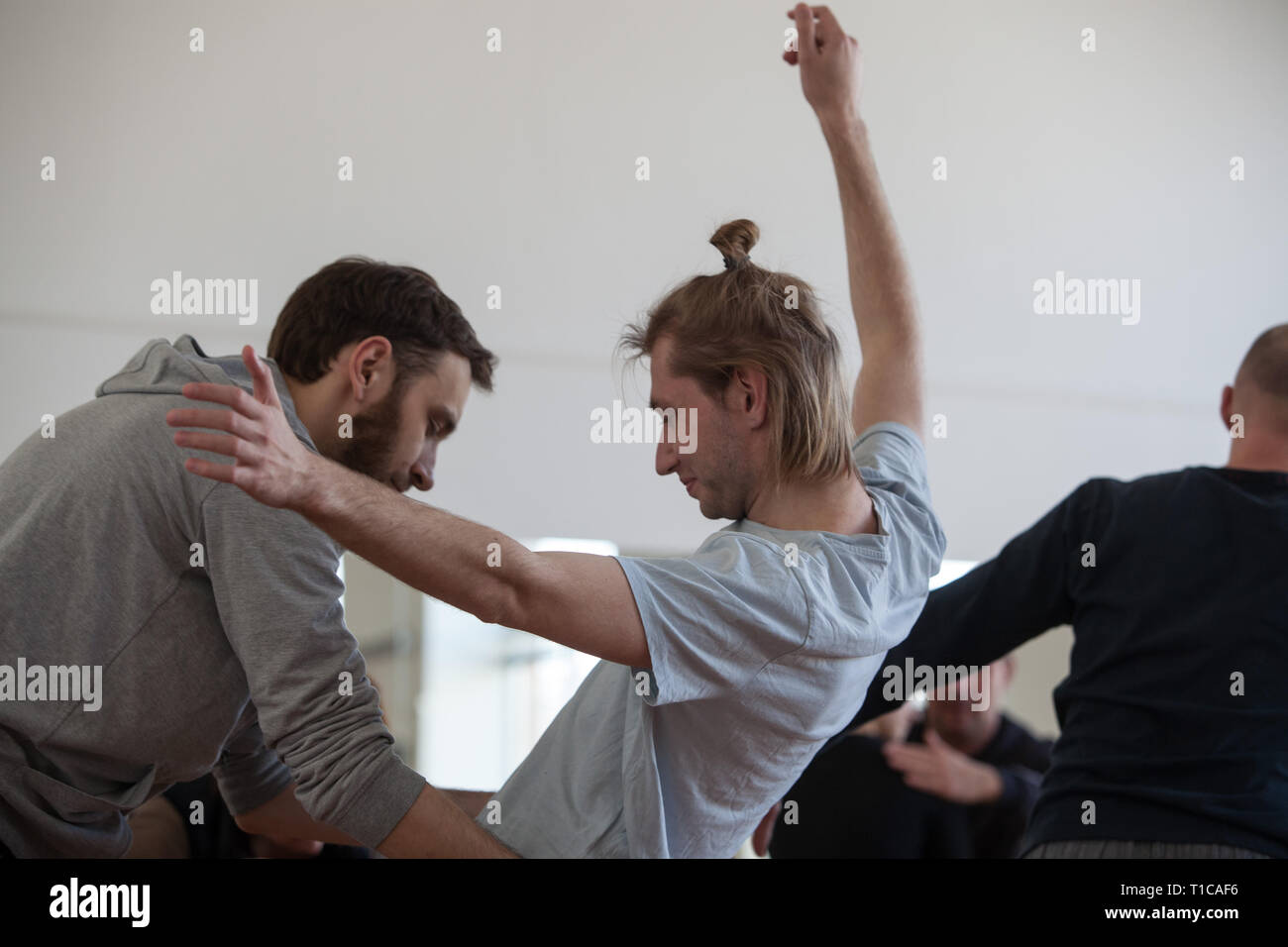 contact dancers moving in touch Stock Photo - Alamy