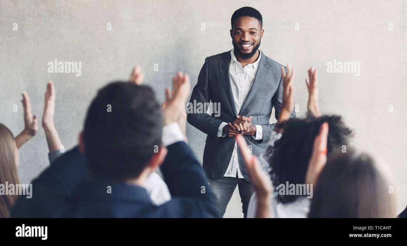 Business training. Audience applauding to speaker after seminar Stock ...