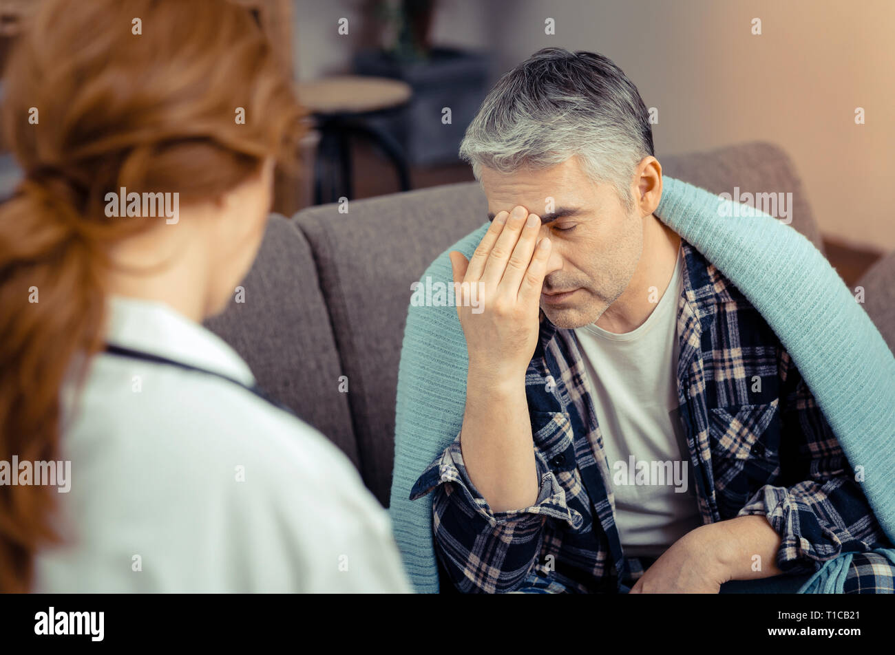 Man headache touching forehead hi-res stock photography and images - Alamy