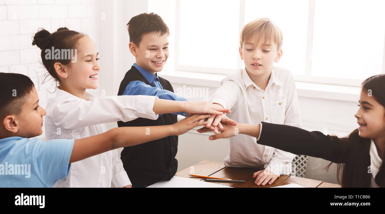 Childhood cooperation hi-res stock photography and images - Alamy