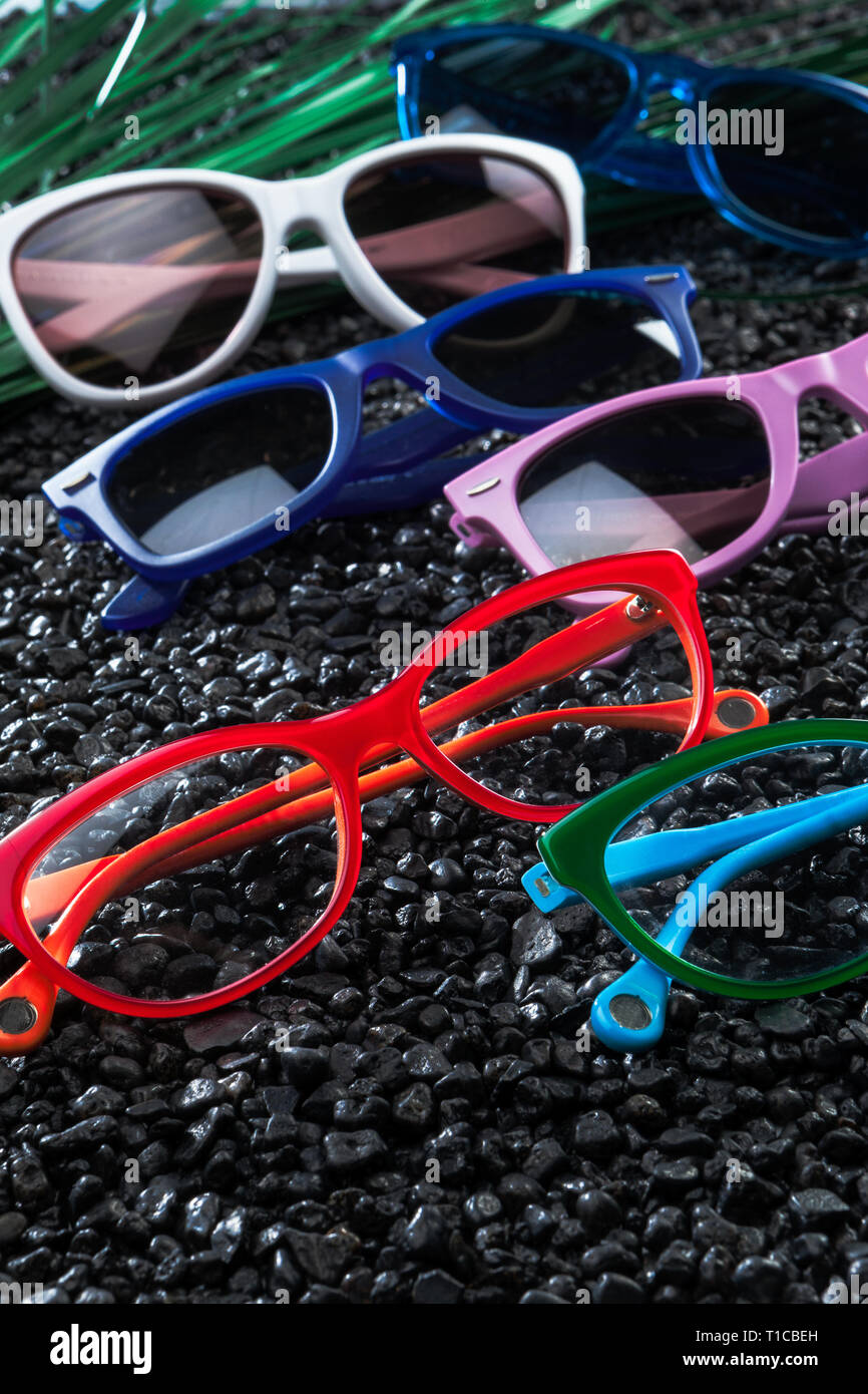 Colorful eyeglasses with a grey background Stock Photo - Alamy