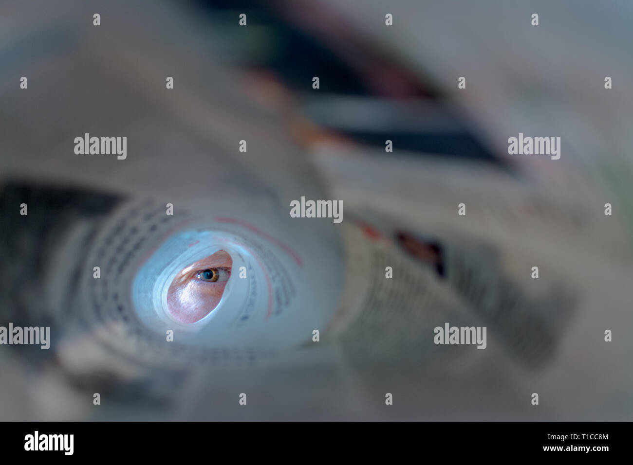 Rolled newspaper hi-res stock photography and images - Alamy