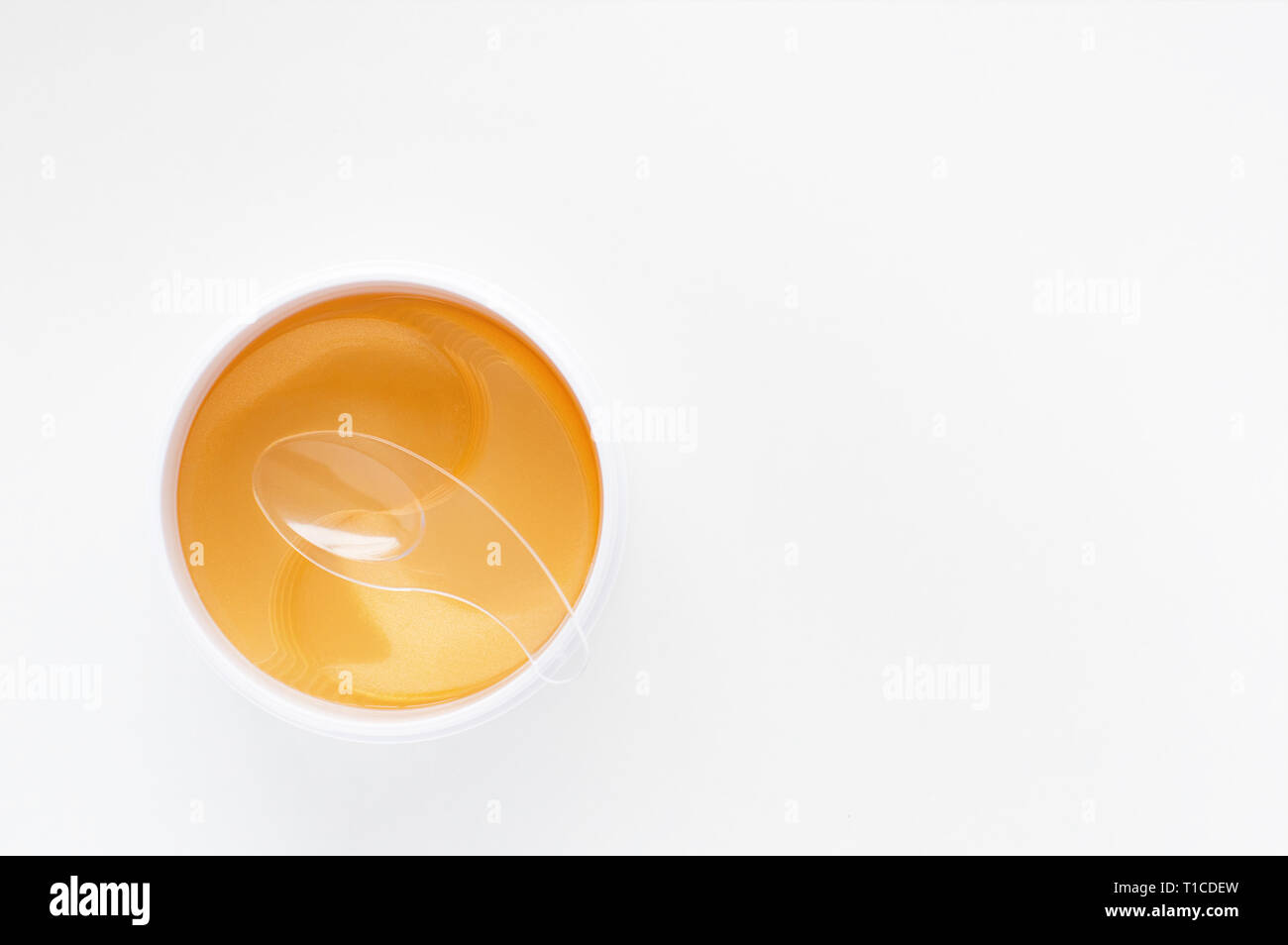 Gold energy hydrogel eye patch. Moisturizing the skin. Top view with ...