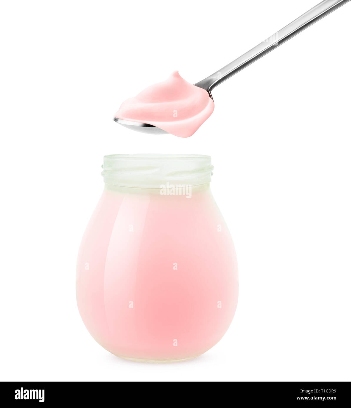 Isolated strawberry yogurt. Open glass jar and spoonful of fresh pink ...