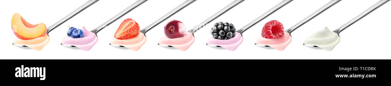 Isolated fruit yogurt collection. Spoons of multicolored yogurt with ...