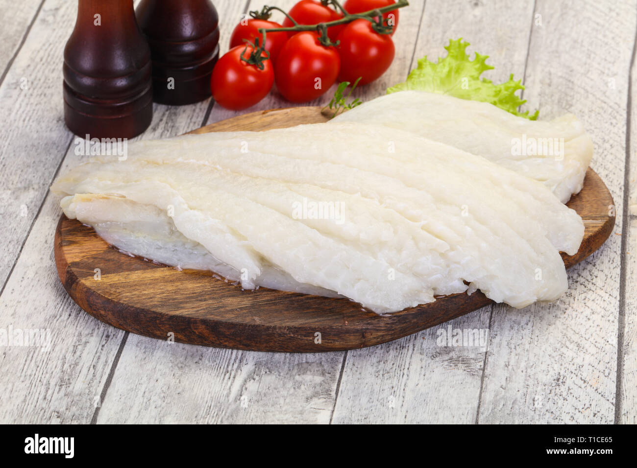 Raw halibut fillet ready for cooking Stock Photo - Alamy