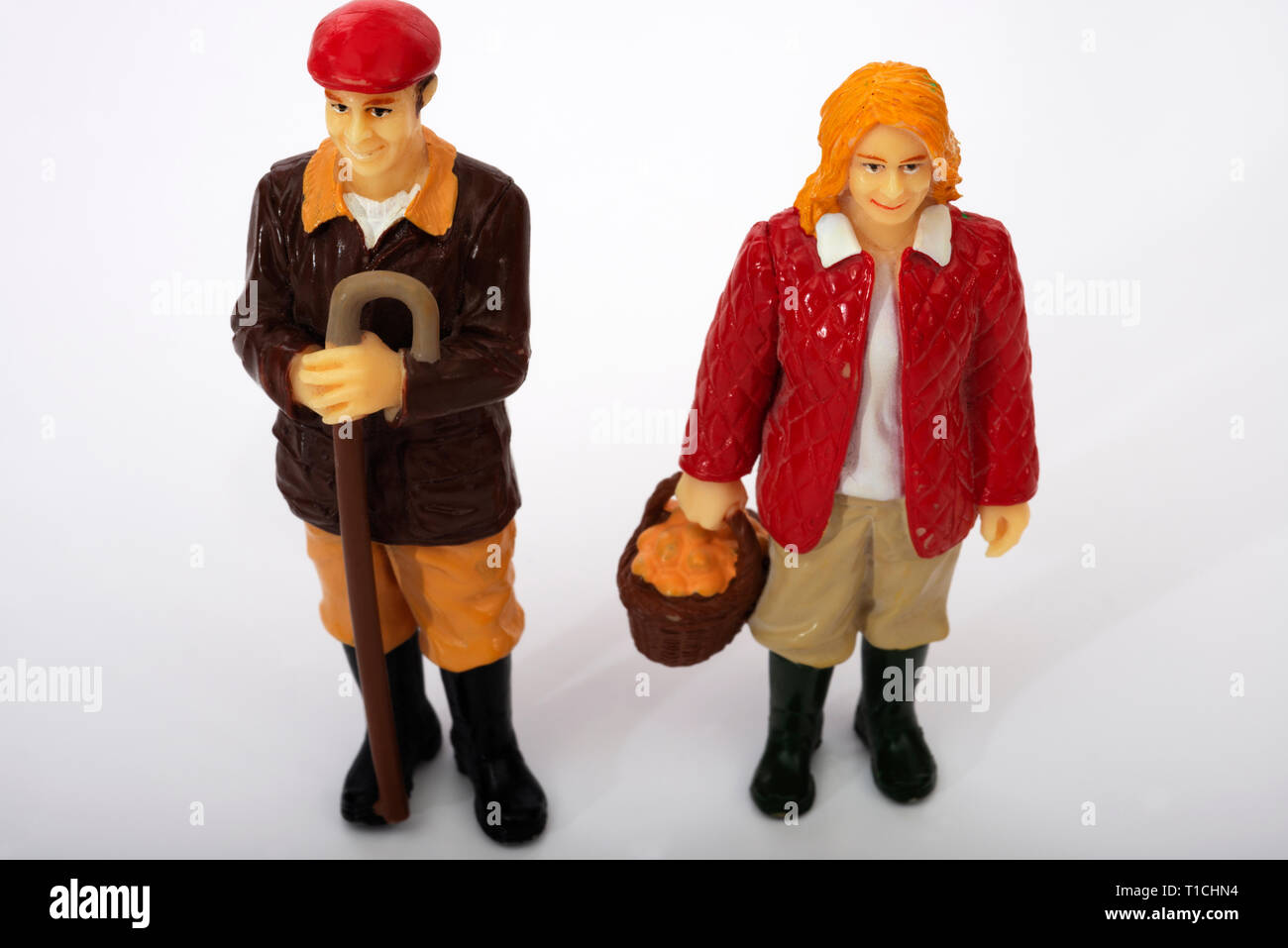 Farmer and wife toy figures Stock Photo - Alamy
