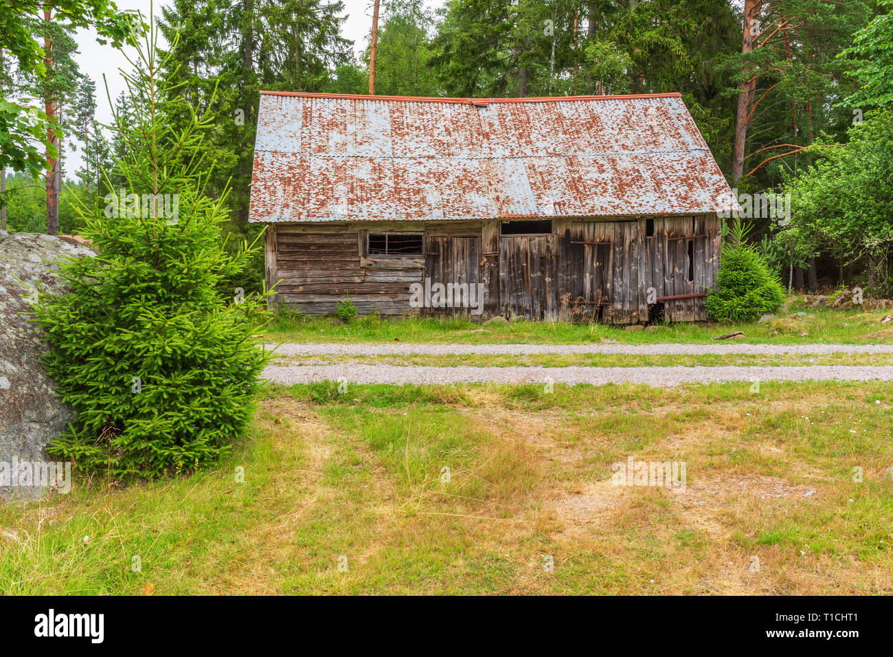 Old abandoned shed by the woods edge Stock Photo - Alamy