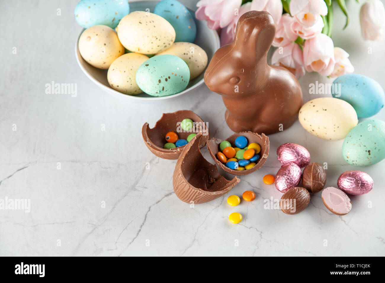 Easter chocolate bunny and eggs Stock Photo - Alamy
