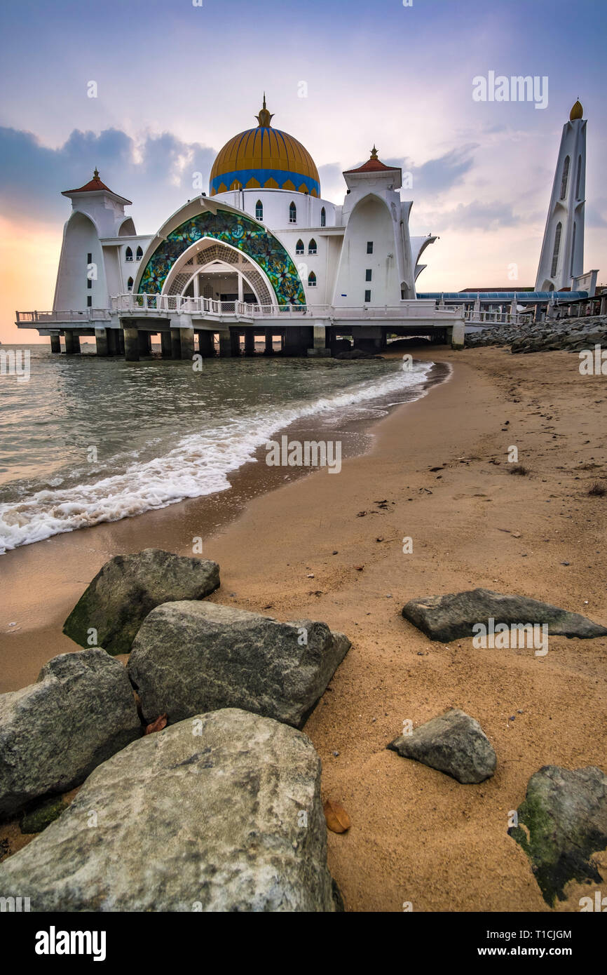 Sunset over Melaka Straits Mosque, located in Malaysia, and built using ...