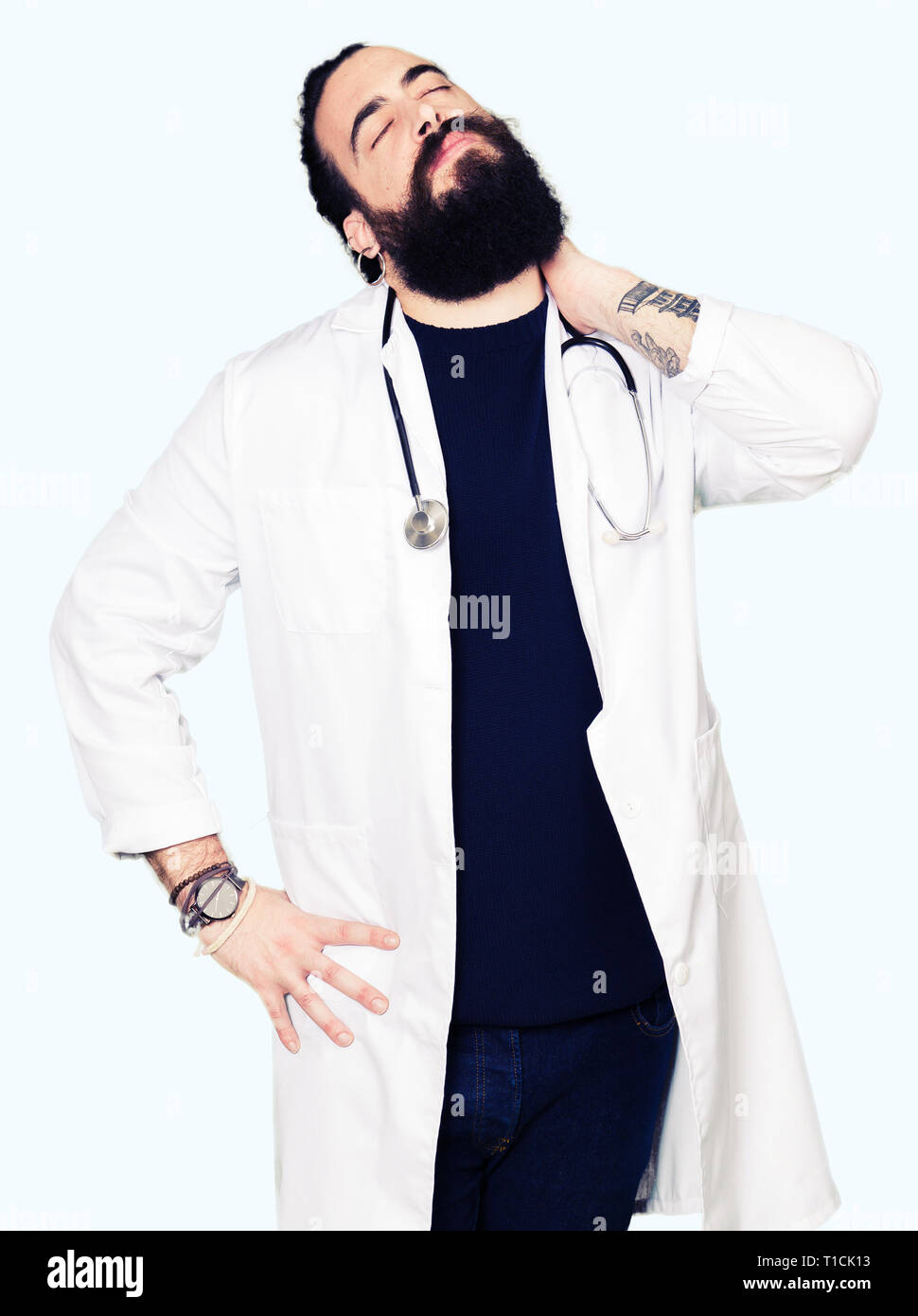 Doctor with long hair wearing medical coat and stethoscope Suffering of ...