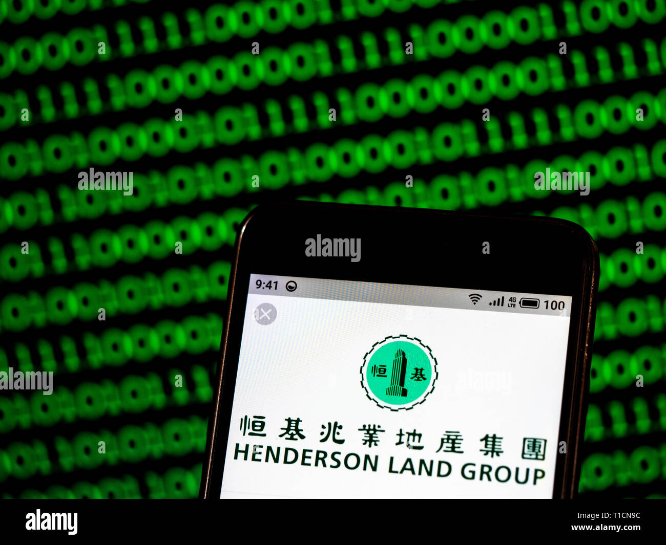 In this photo illustration a Henderson Land Development logo seen ...