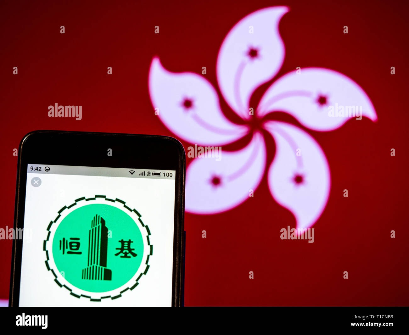In this photo illustration a Henderson Land Development logo seen ...