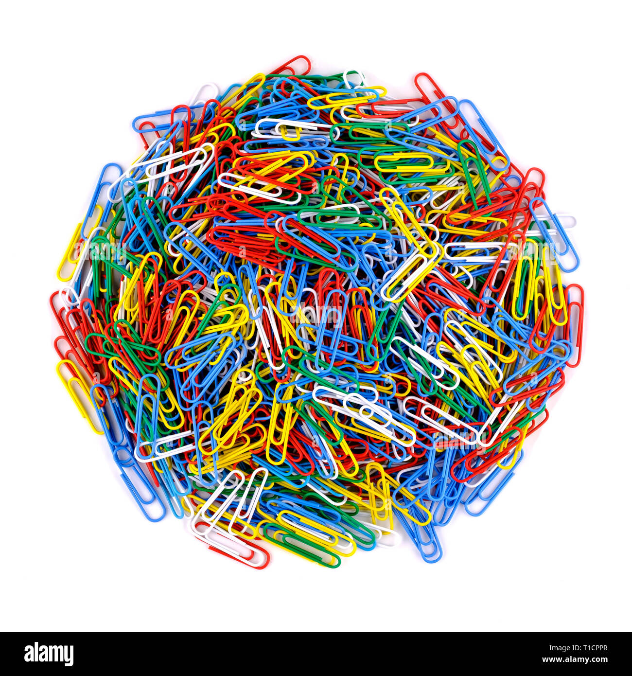 Pile of colored paper clips on isolated white background. Close up view ...