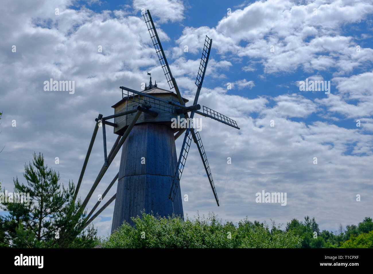 Landscape with Old wooden windmill Stock Photo - Alamy