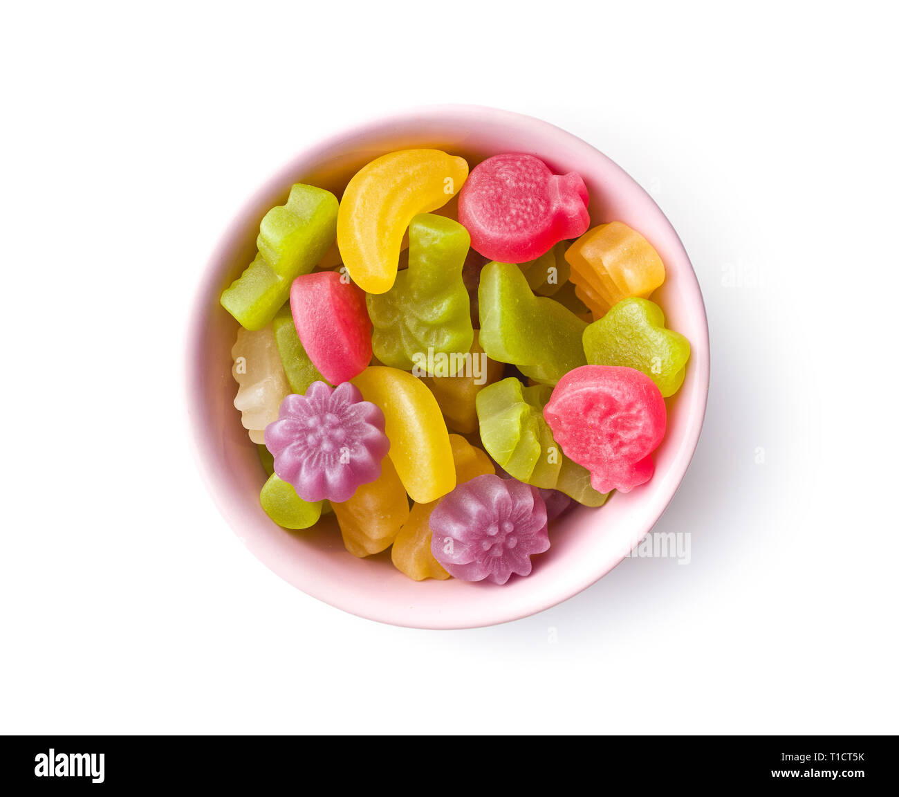 Fruit jelly candies in bowl isolated on white background Stock Photo ...