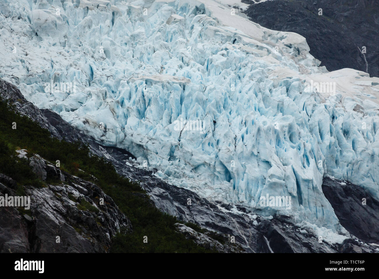 Aerial view of melting turquoise glacier in fjord in Alaska Stock Photo ...