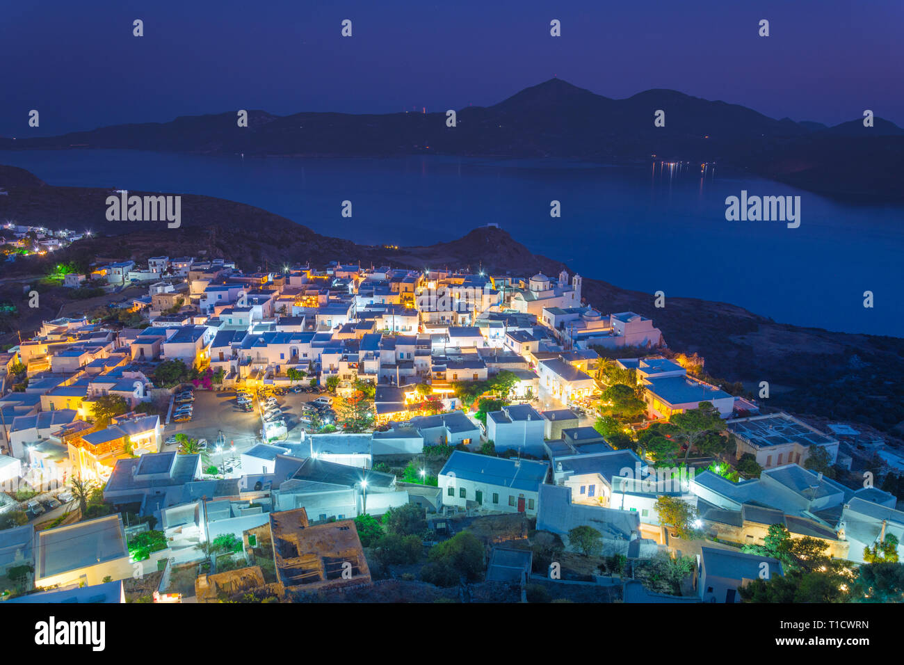 Plaka village view at night, Milos island, Cyclades, Greece Stock Photo ...