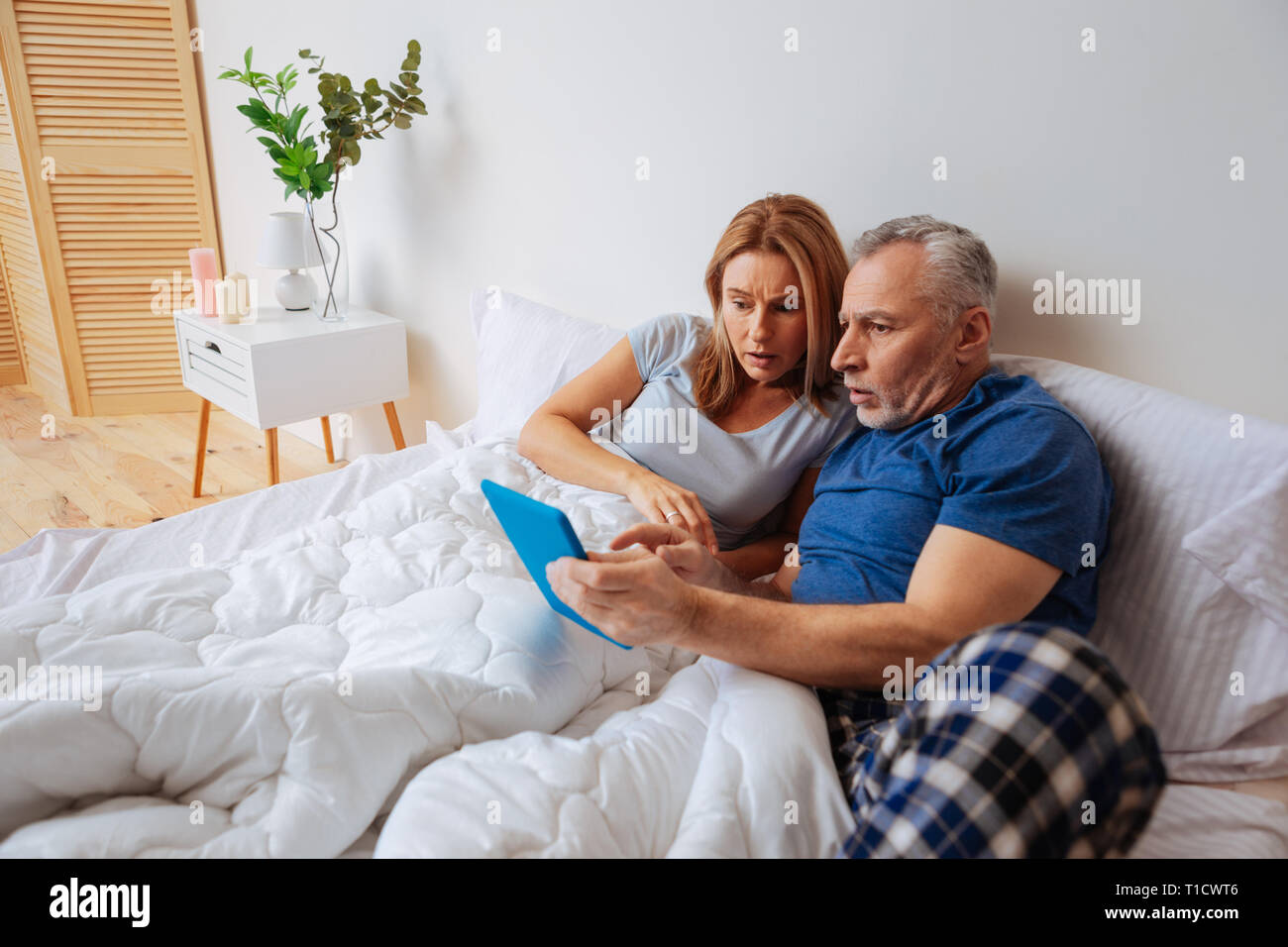 Businessmen feeling worried after reading the message from daughter ...